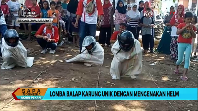 Lomba Balap Karung Unik Gunakan Helm